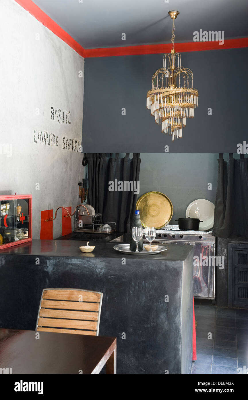 Moroccan kitchen with lettering on walls and ornate chandelier Stock ...