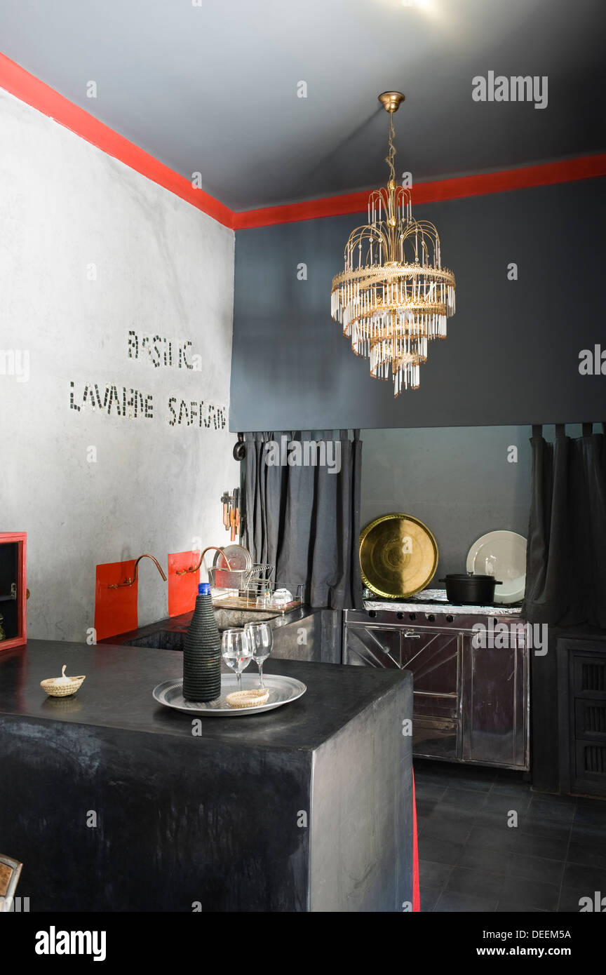 Moroccan kitchen with lettering on walls and ornate chandelier Stock ...