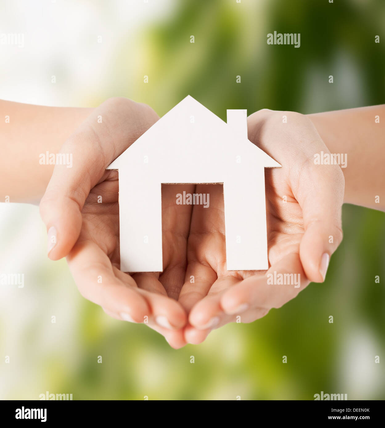 hands holding house Stock Photo - Alamy