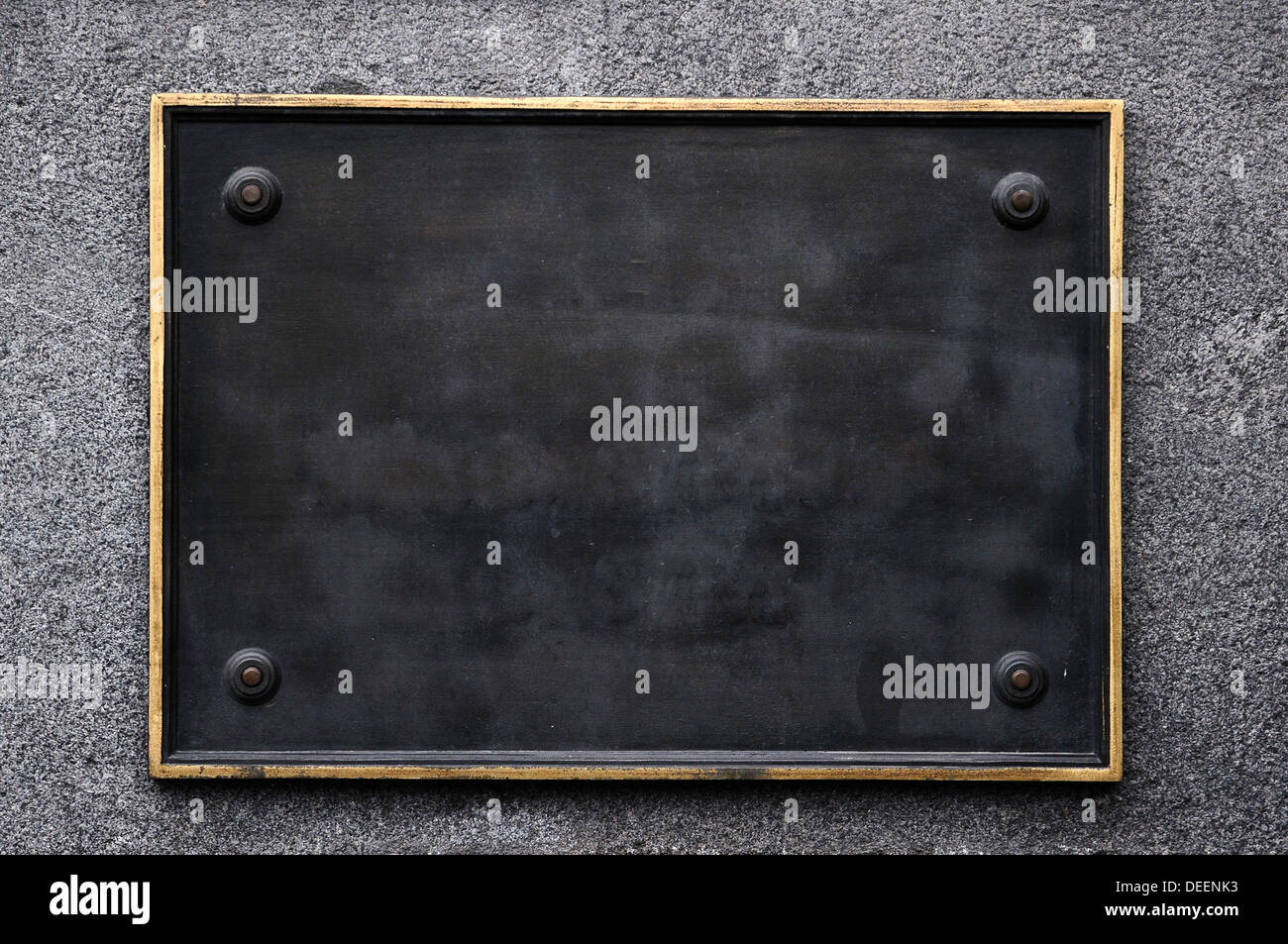 old weathered black street sign hanging on wall Stock Photo - Alamy
