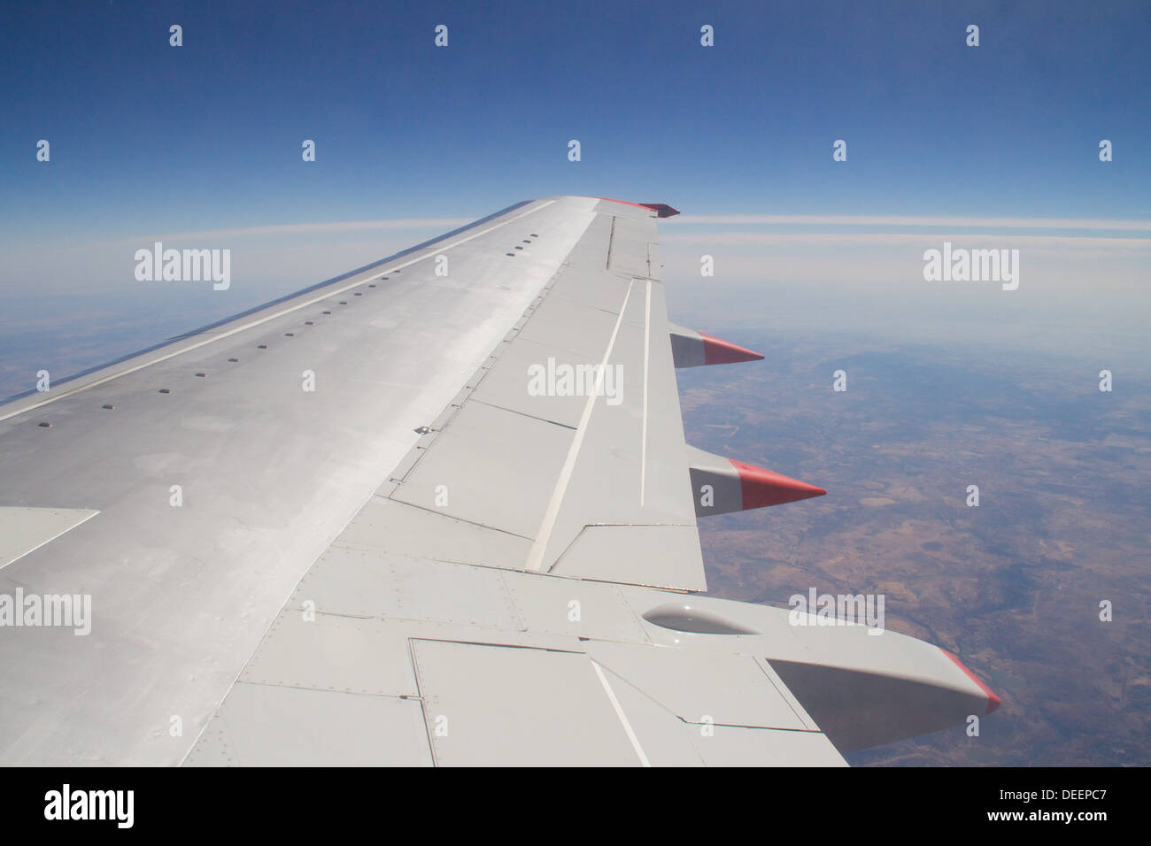 An Airplane Wing in Flight Stock Photo - Alamy