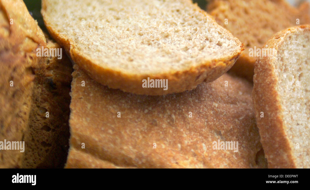 Slices of crusty brown bread Stock Photo - Alamy