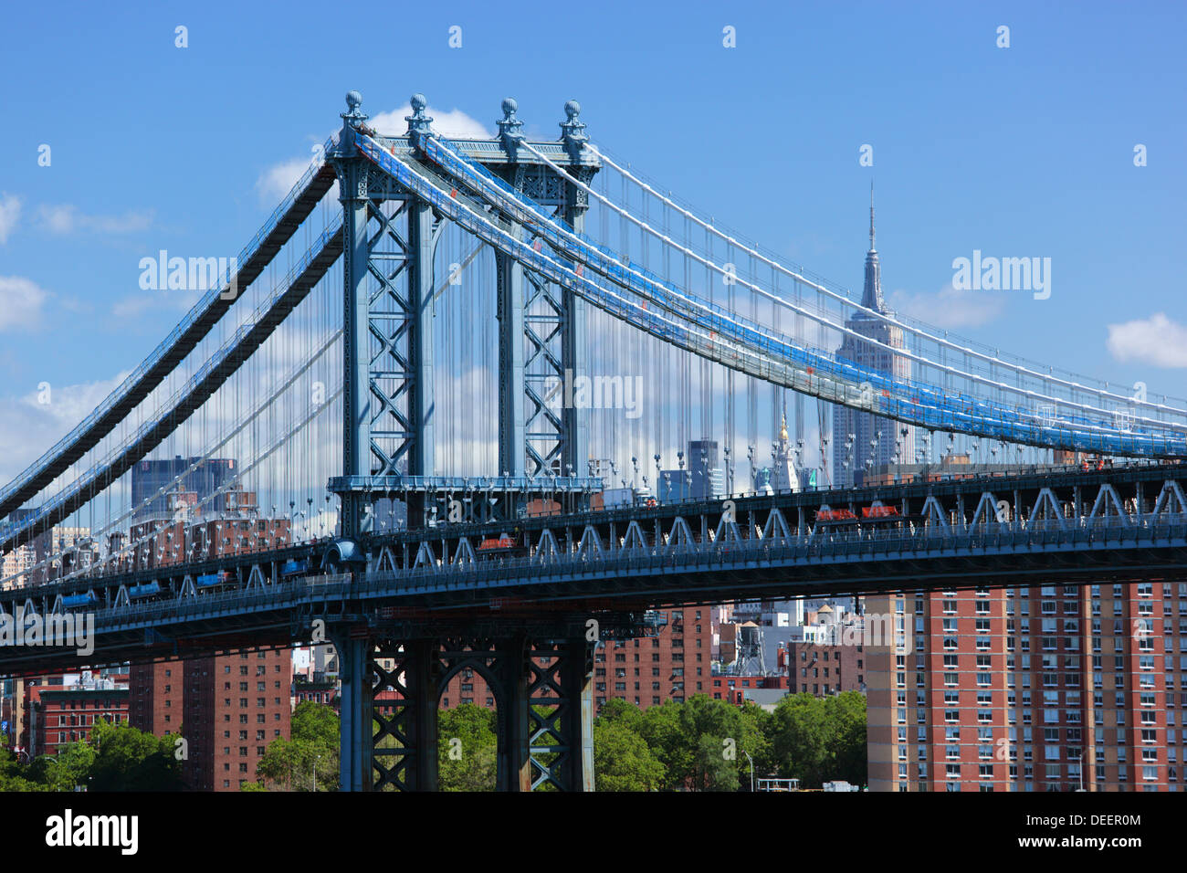 The Empire State building in Midtown and the Manhattan Bridge in New ...