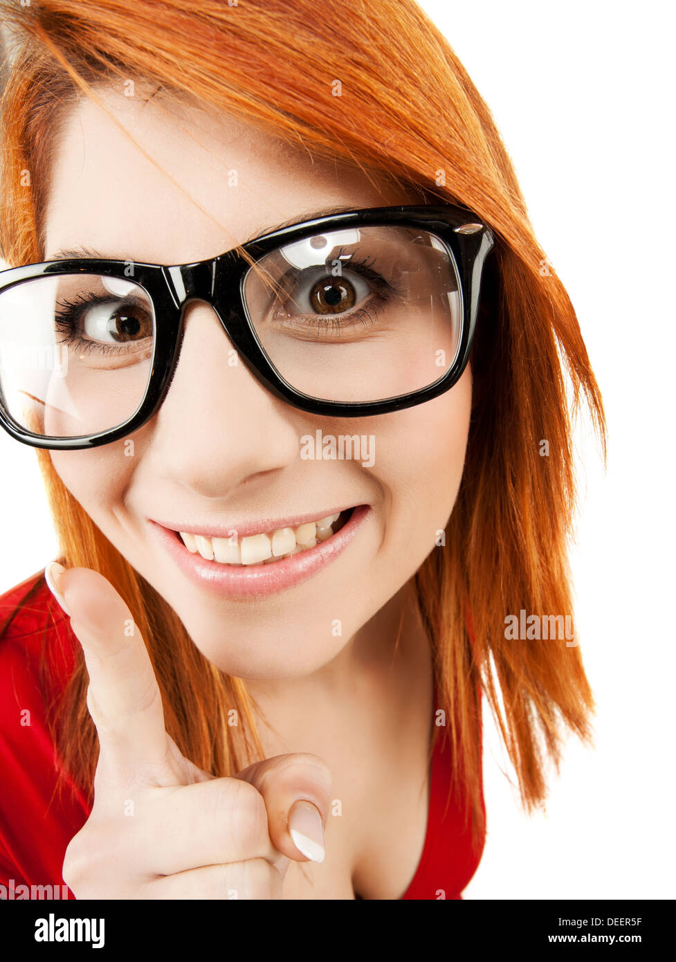 woman in glasses with finger up Stock Photo - Alamy