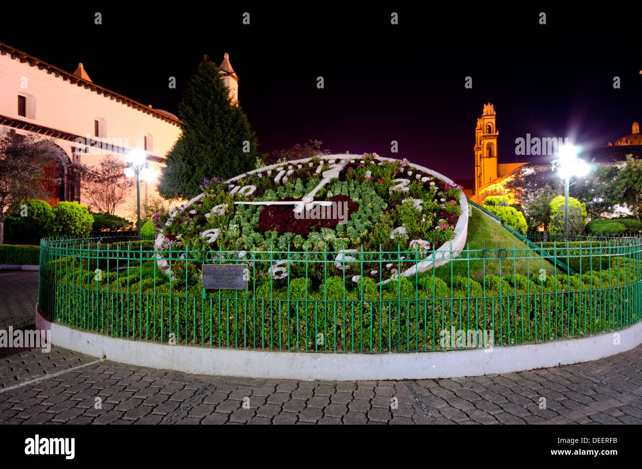 Night view of flower clock in the main square of Zacatlan in Puebla ...