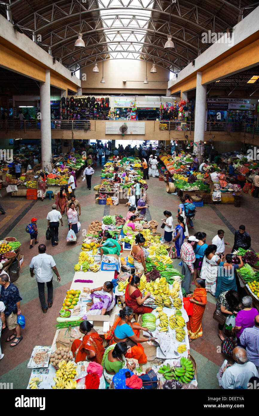 People buying vegetables from a vegetable market, Municipal Market ...