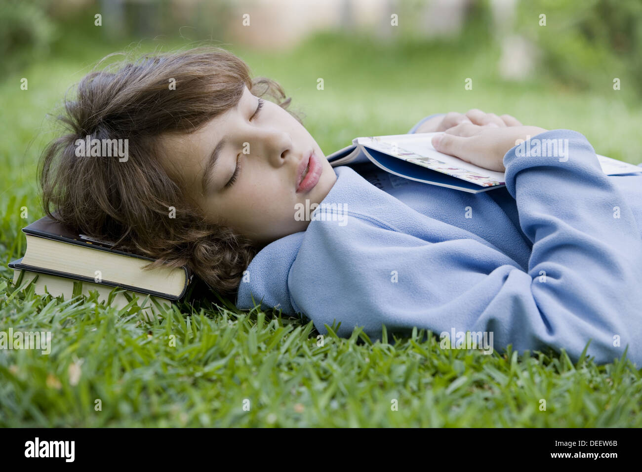 Child laying on ground hi-res stock photography and images - Alamy