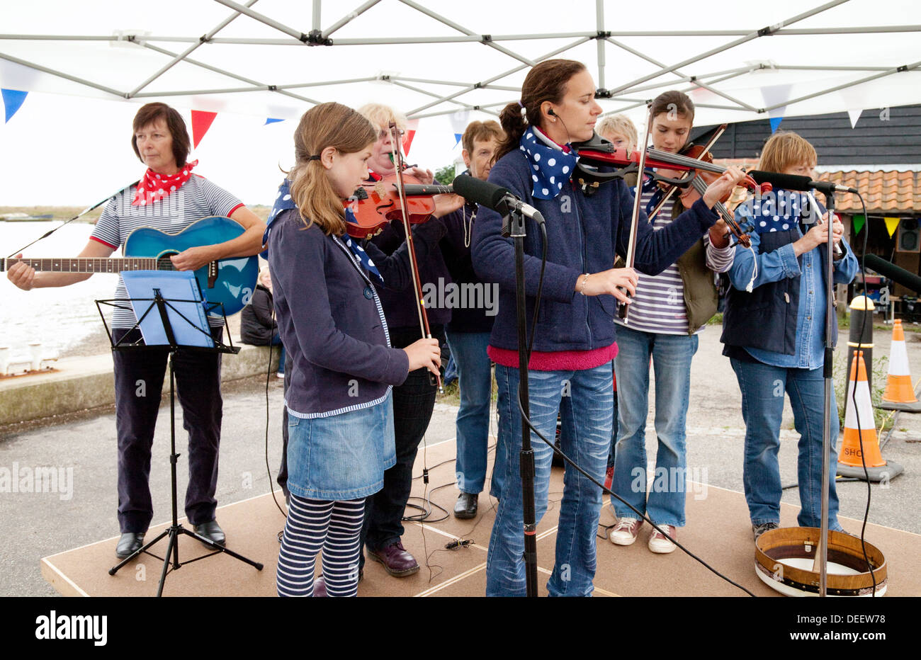 A local folk group playing at Orford Village fair, Suffolk England UK ...