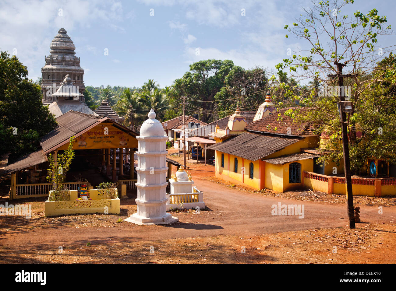 Buildings with a temple in the background, Goa, India Stock Photo - Alamy