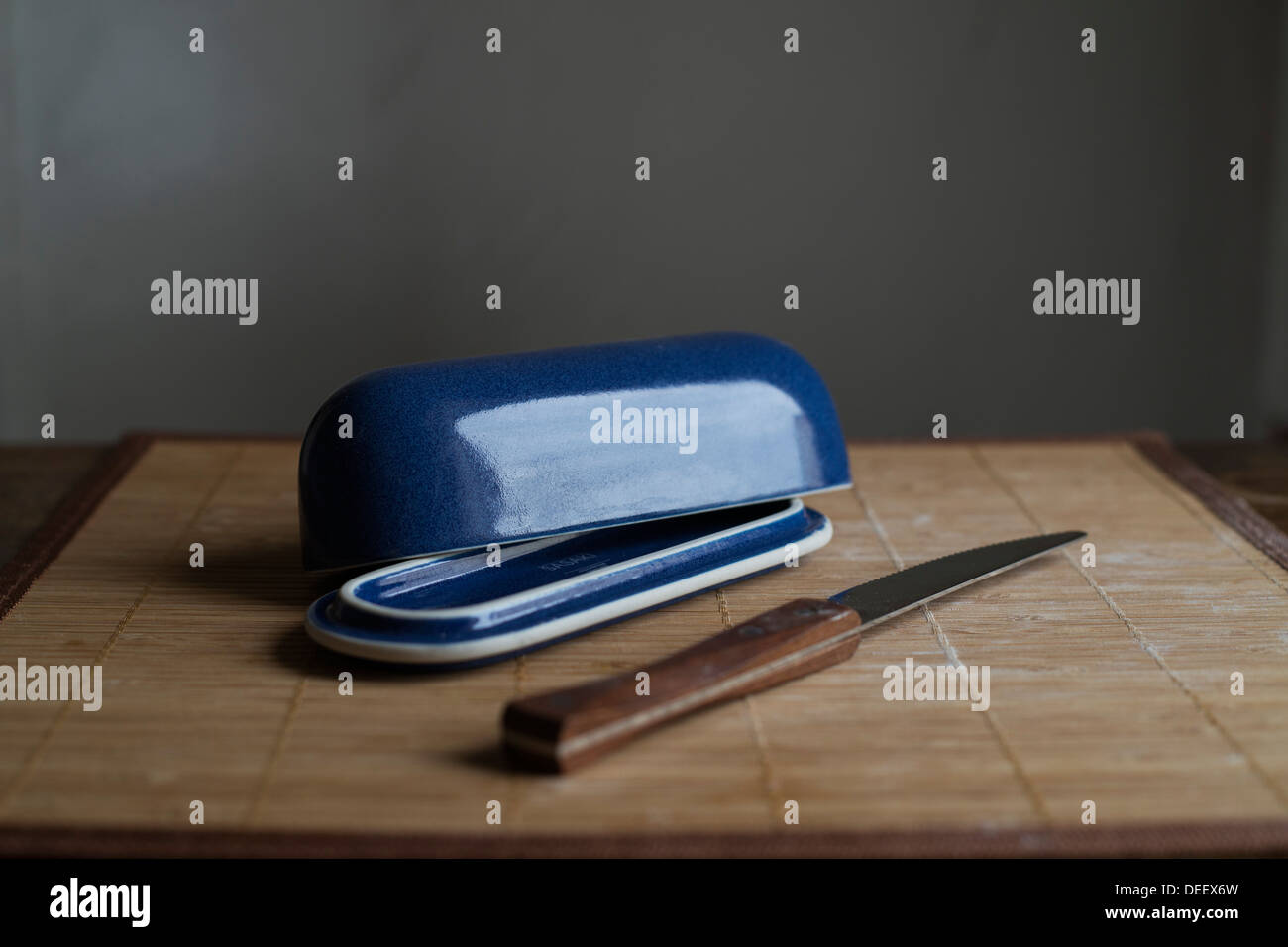 Blue butter dish with knife Stock Photo - Alamy