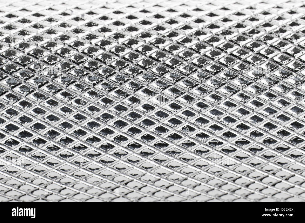 Metal mesh plating isolated against a white background Stock Photo - Alamy
