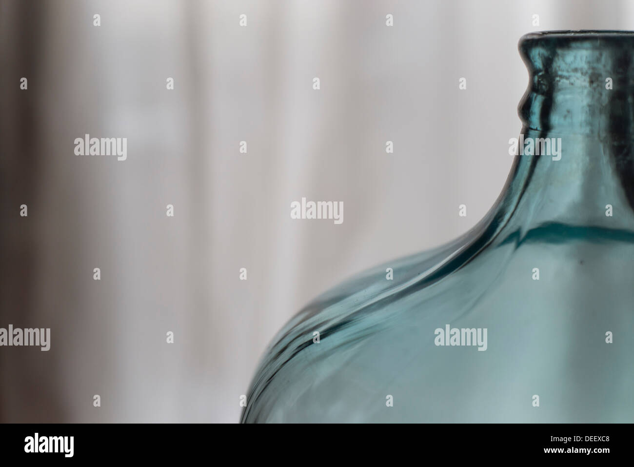 Top of glass 5 gallon jug Stock Photo - Alamy