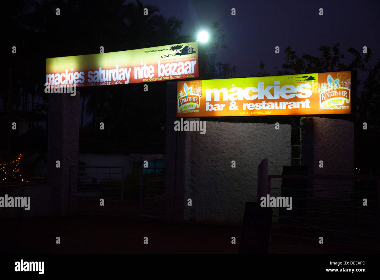 Sign boards lit up at night, Mackies Flea Market, Arpora Baga Road ...