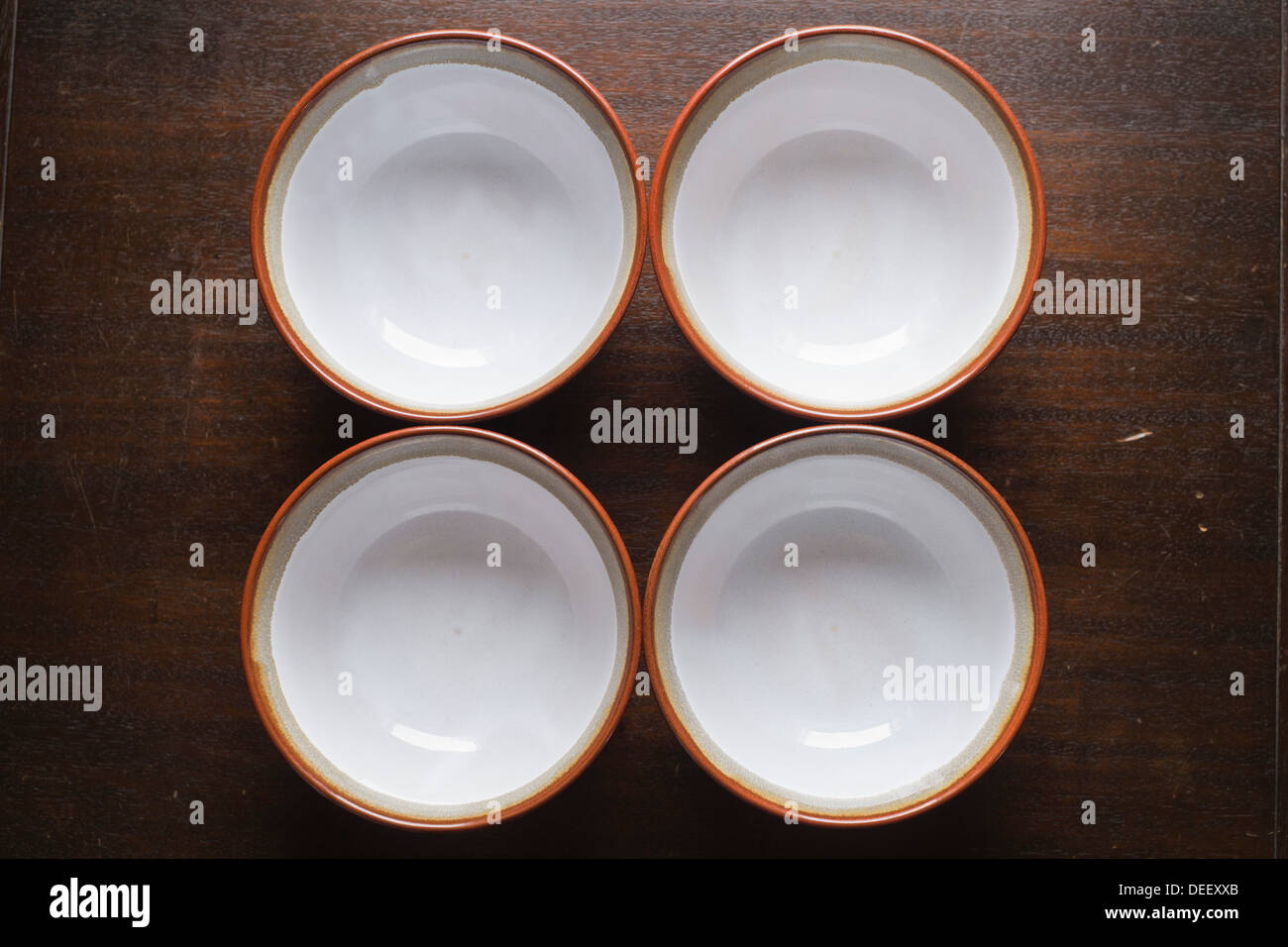 Four ceramic bowls Stock Photo - Alamy