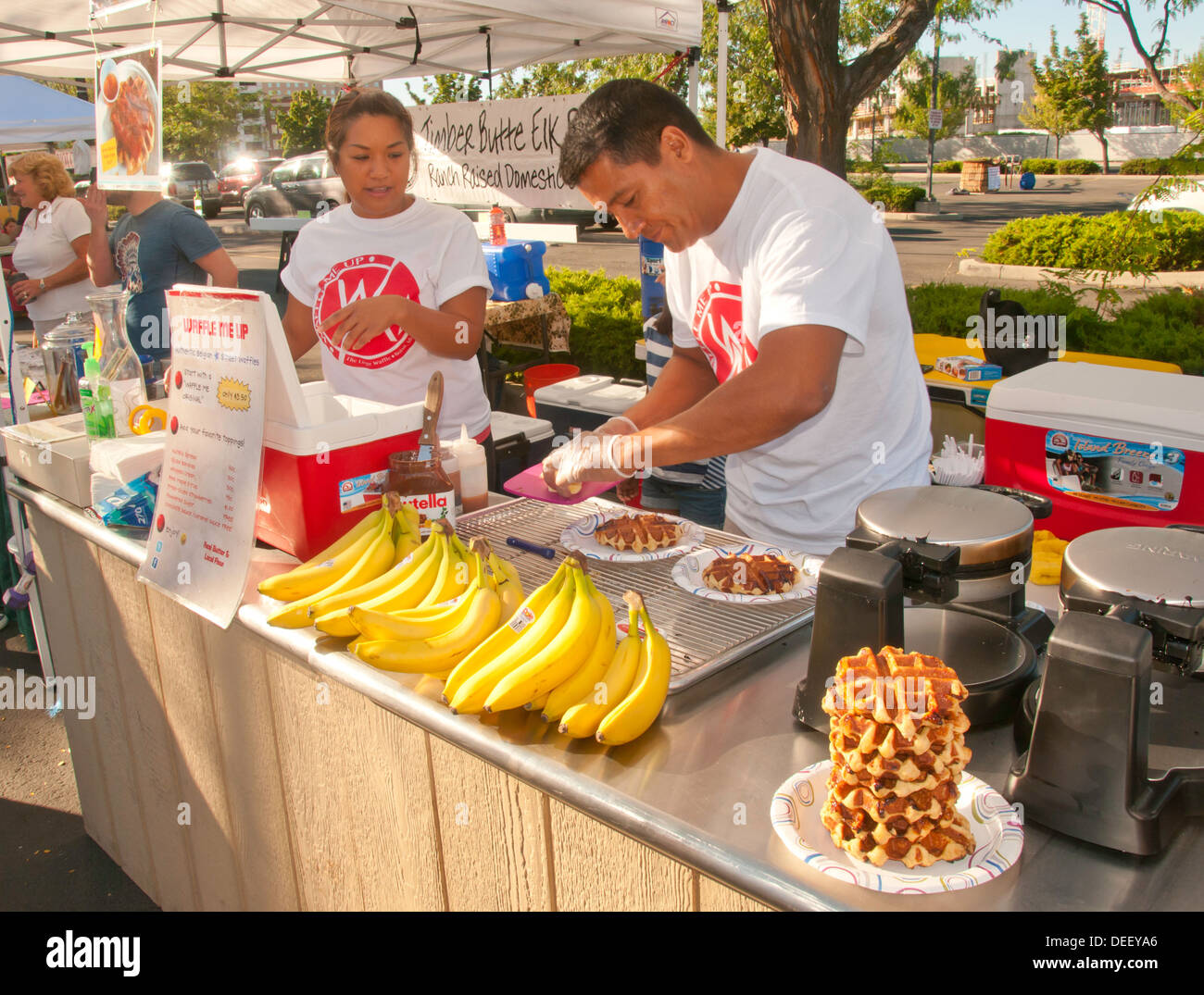 Local merchants making Authentic Begian Waffles at the Farmers Market ...