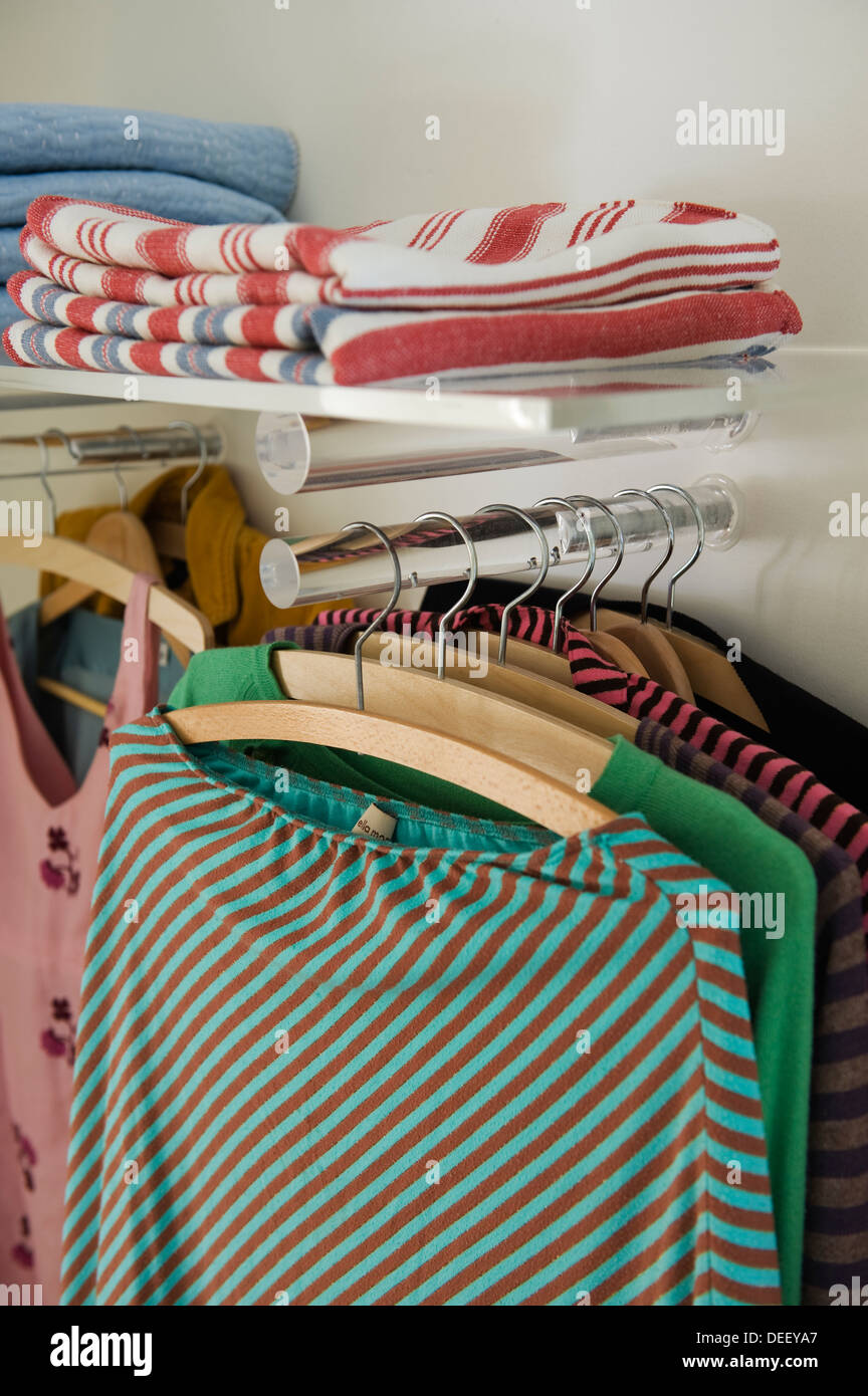 Clothes storage shelves and hanging area Stock Photo - Alamy