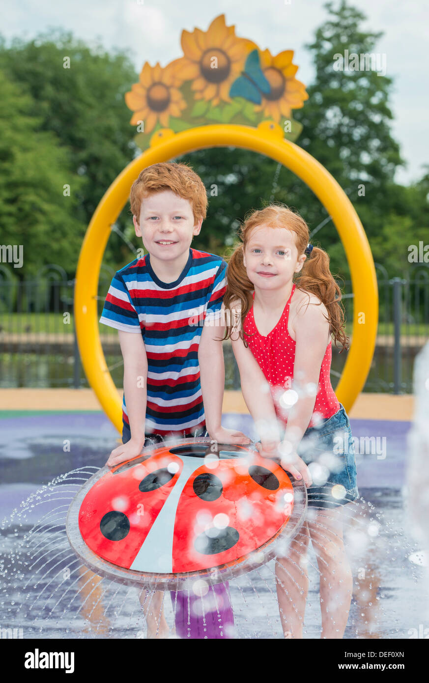 Children playing water in hi-res stock photography and images - Alamy
