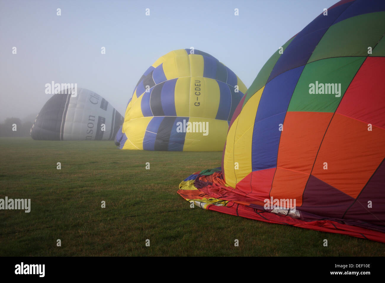 Hot air balloon being inflated Stock Photo - Alamy