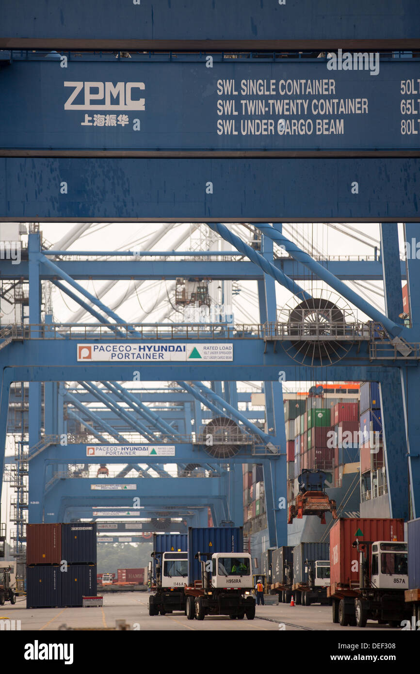 Workers unload three container ships at Charleston Ports Wando Welch ...