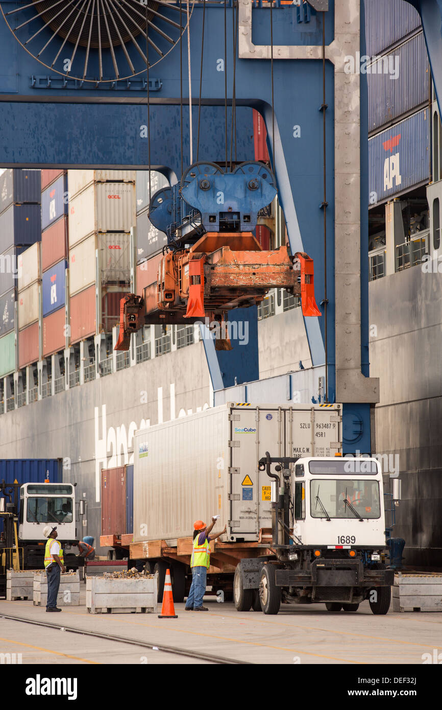 Workers unload three container ships at Charleston Ports Wando Welch ...