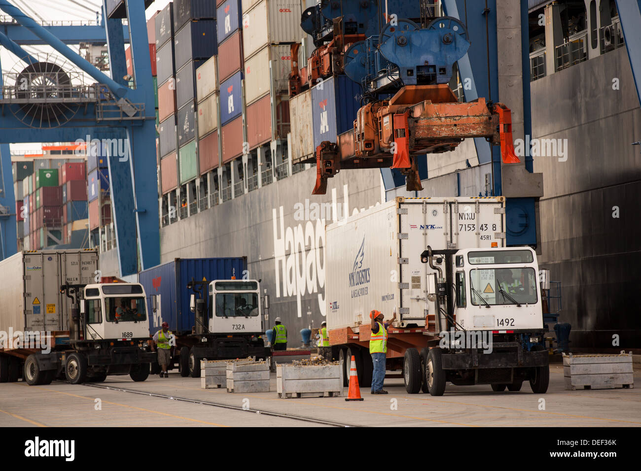 Workers unload three container ships at Charleston Ports Wando Welch ...