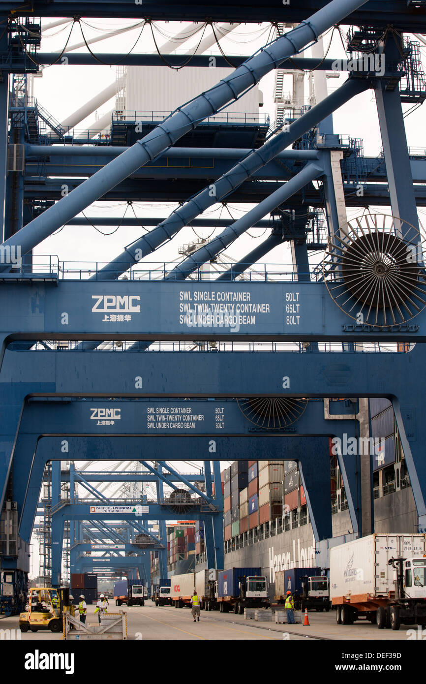 Workers unload three container ships at Charleston Ports Wando Welch ...