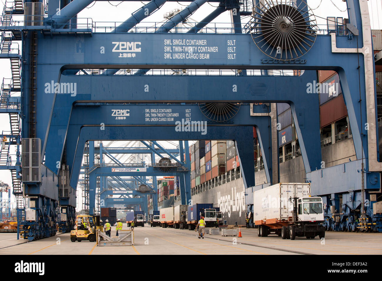 Workers unload three container ships at Charleston Ports Wando Welch ...
