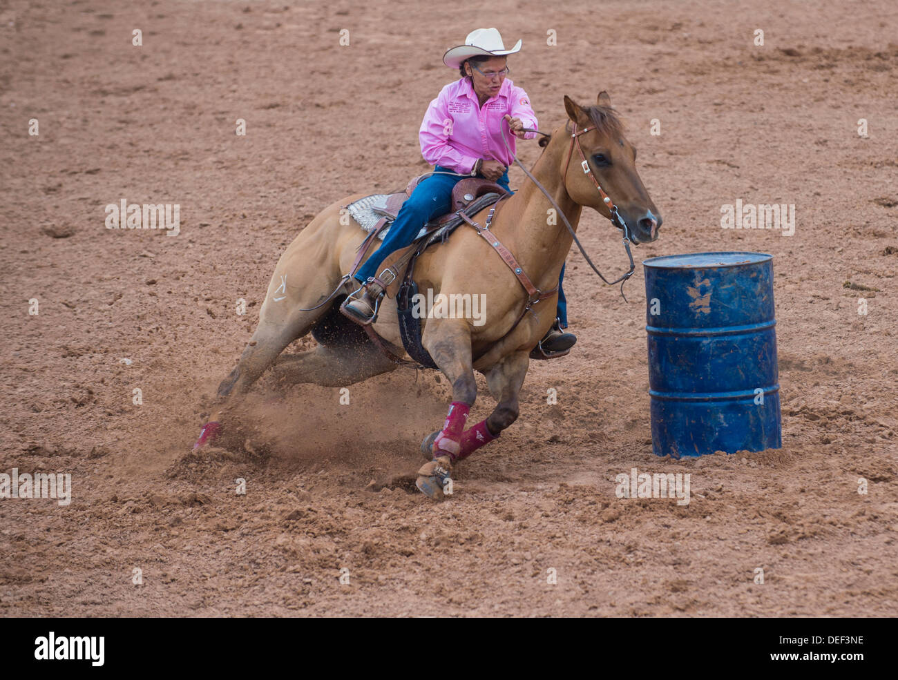 Cowgirl Participant in a Barrel racing competition at the 92nd annual ...
