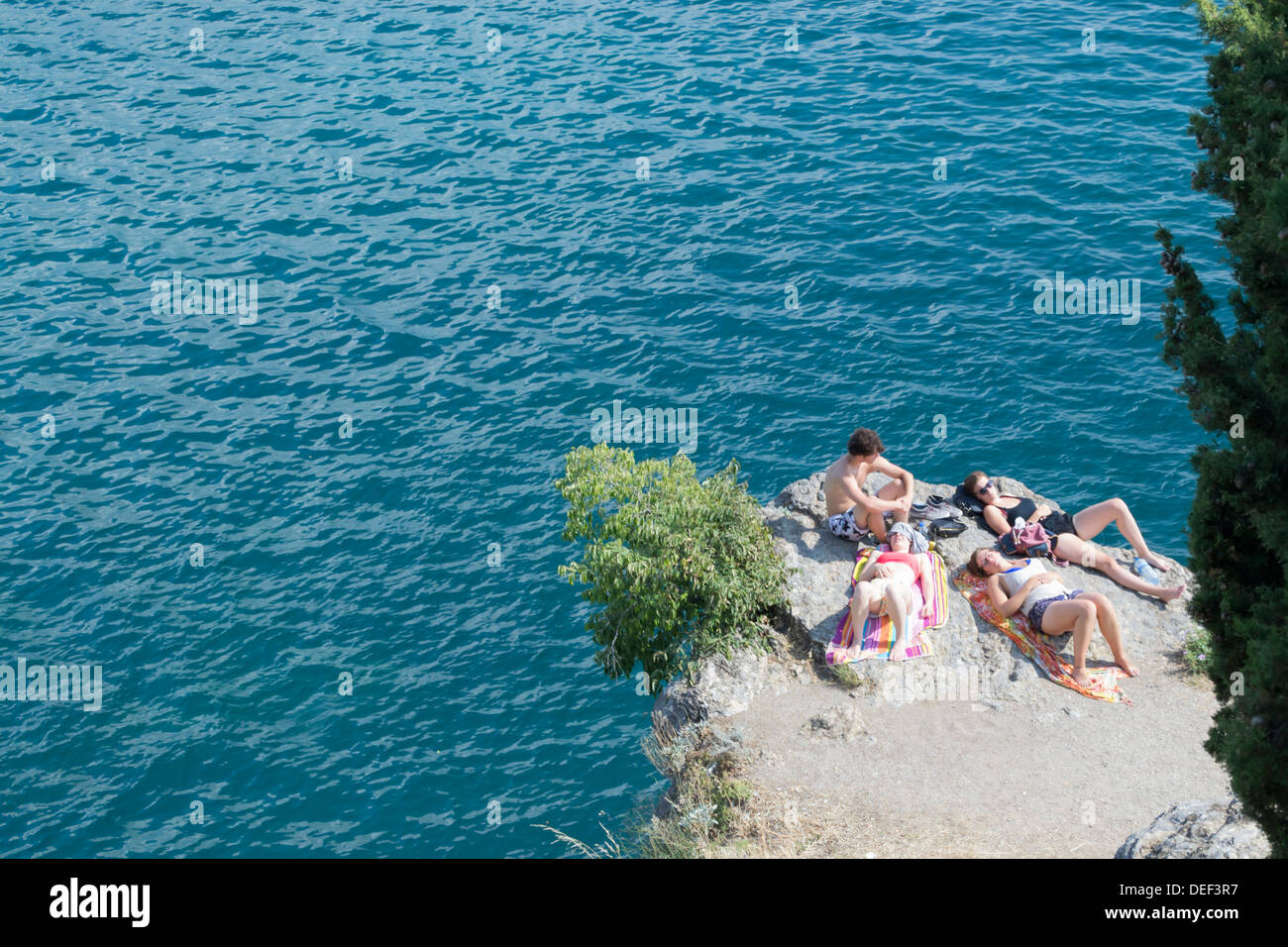 Tan at the beach hi-res stock photography and images - Alamy