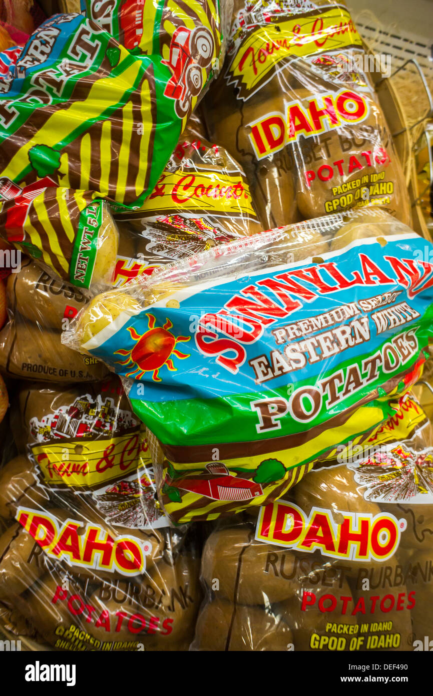 A supermarket display of bags of U.S. grown potatoes in New York Stock ...