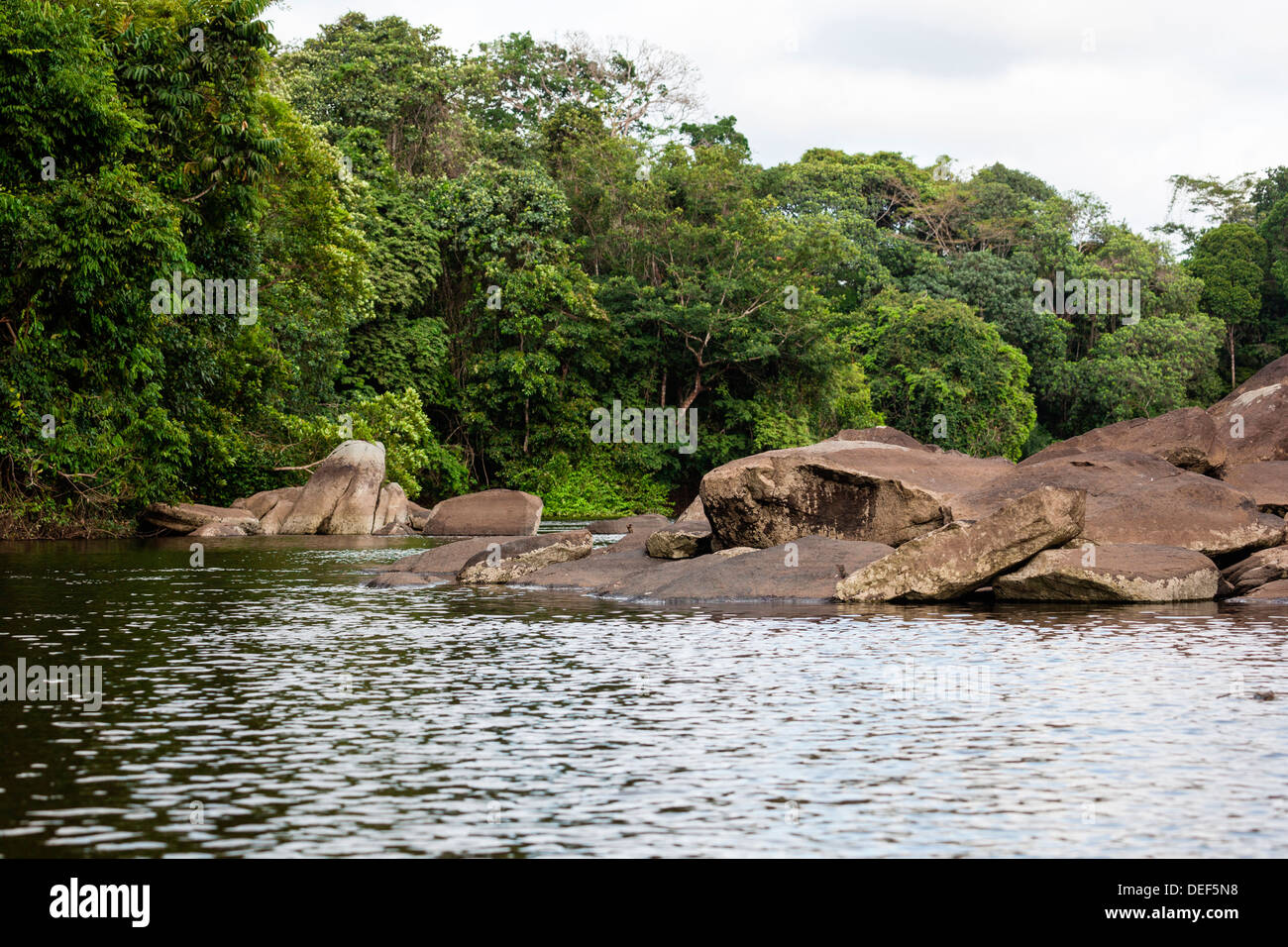 Africa, Cameroon, Kribi. View of rocky shoreline along the Du River ...