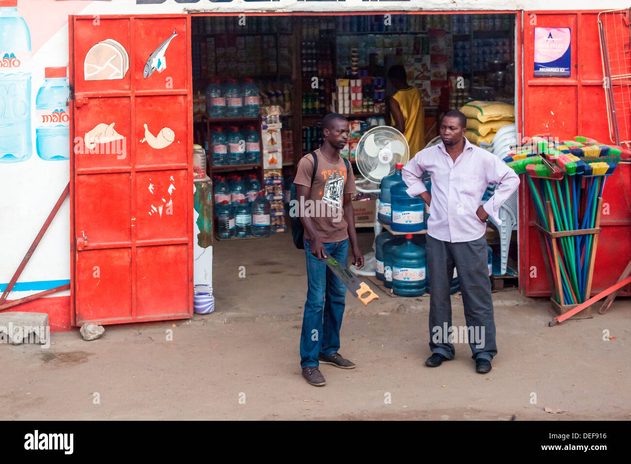 Africa, Congo, Point Noire. Men standing outside store Stock Photo - Alamy