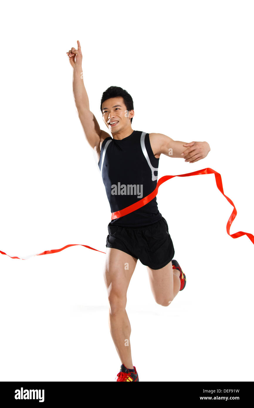 Young athlete with finish line Stock Photo - Alamy