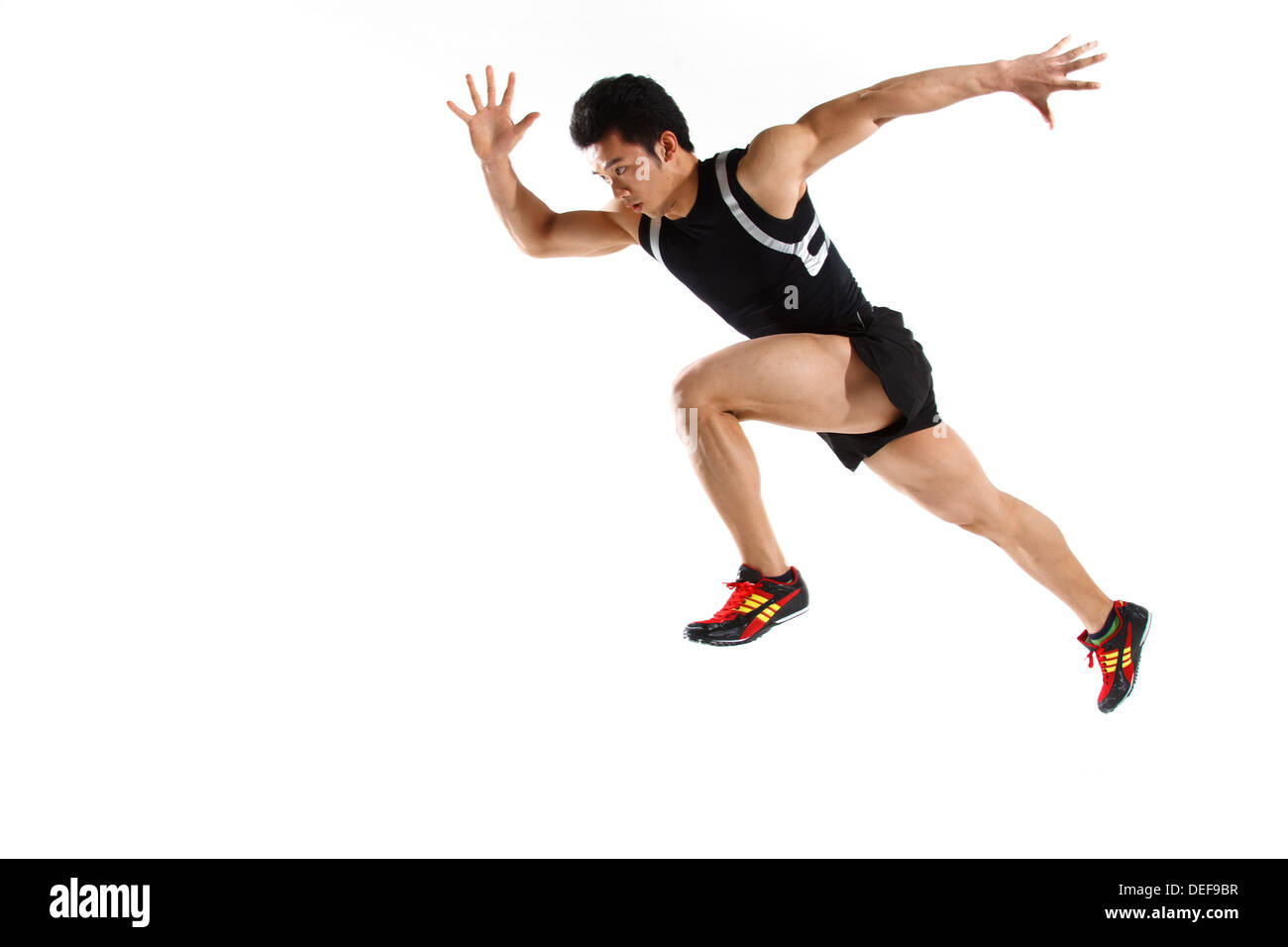 Young male runner training Cut Out Stock Images & Pictures - Alamy