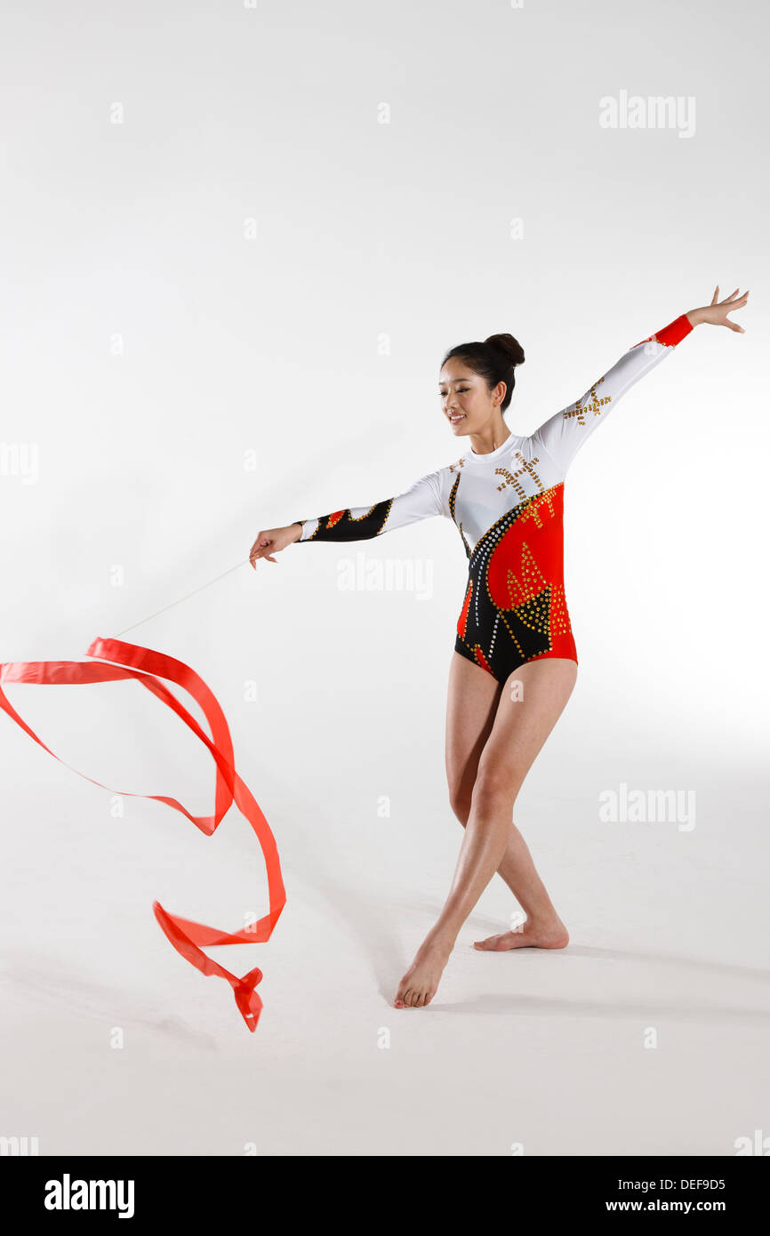 Young woman doing rhythmic gymnastics Stock Photo - Alamy