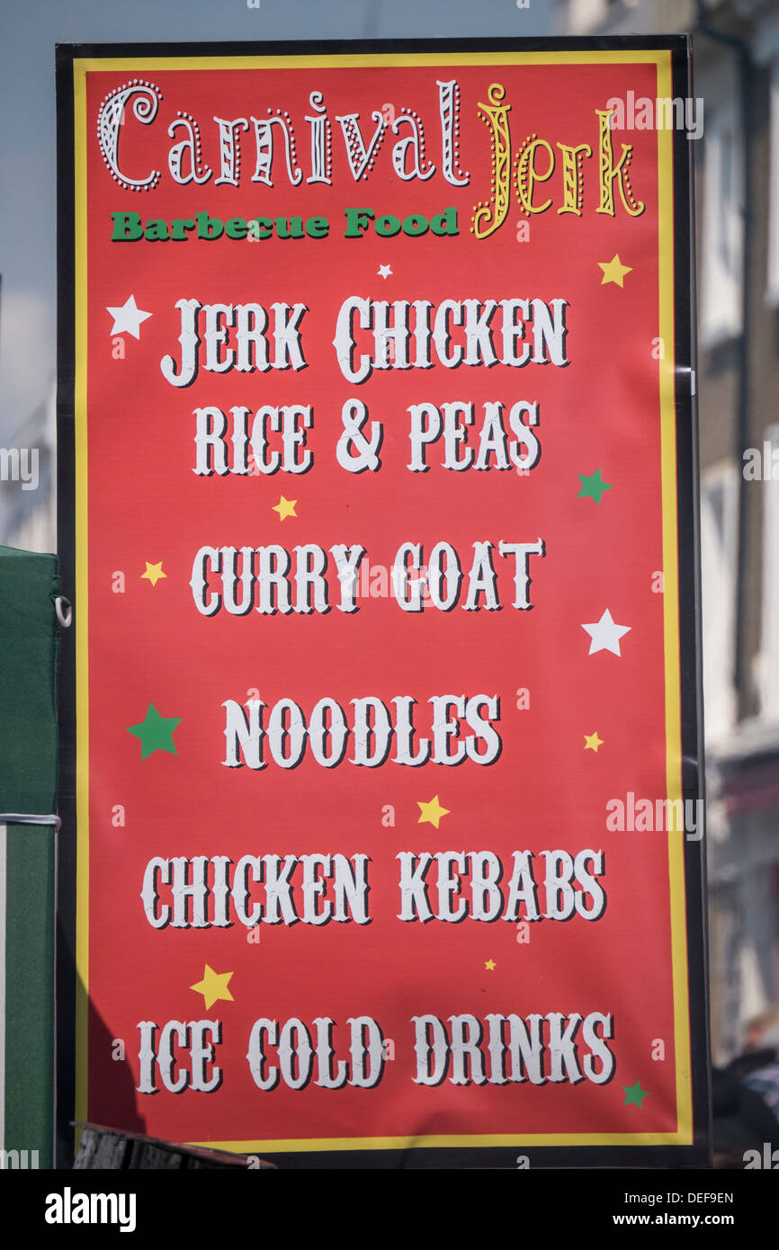 LONDON, UK - AUGUST 26, 2013: Colourful Sign on food stall at Notting ...