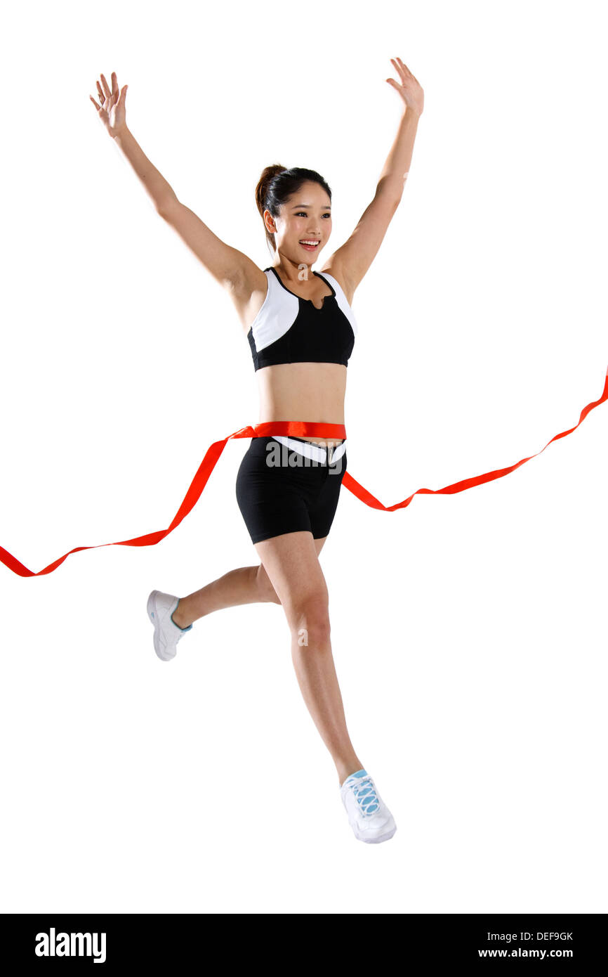 Young woman with finish line Stock Photo - Alamy