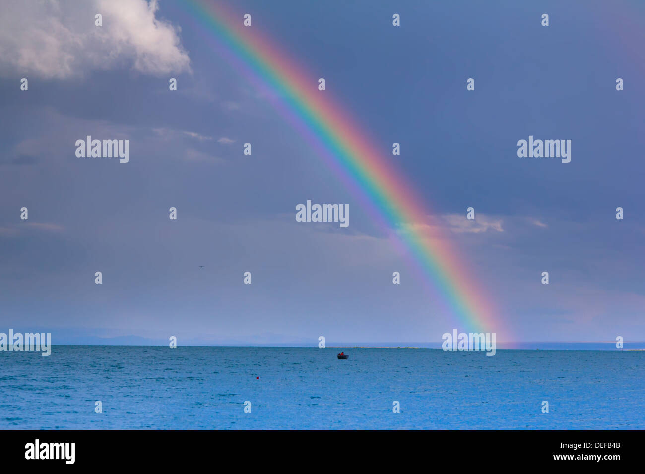 Sun rain rainbow beach hi-res stock photography and images - Alamy