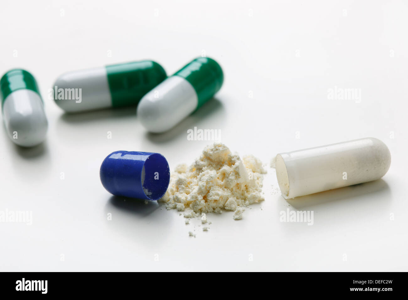 Medicine capsule broken in hi-res stock photography and images - Alamy