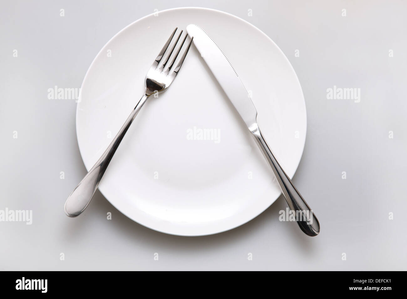 Dish,folk and knife Stock Photo - Alamy