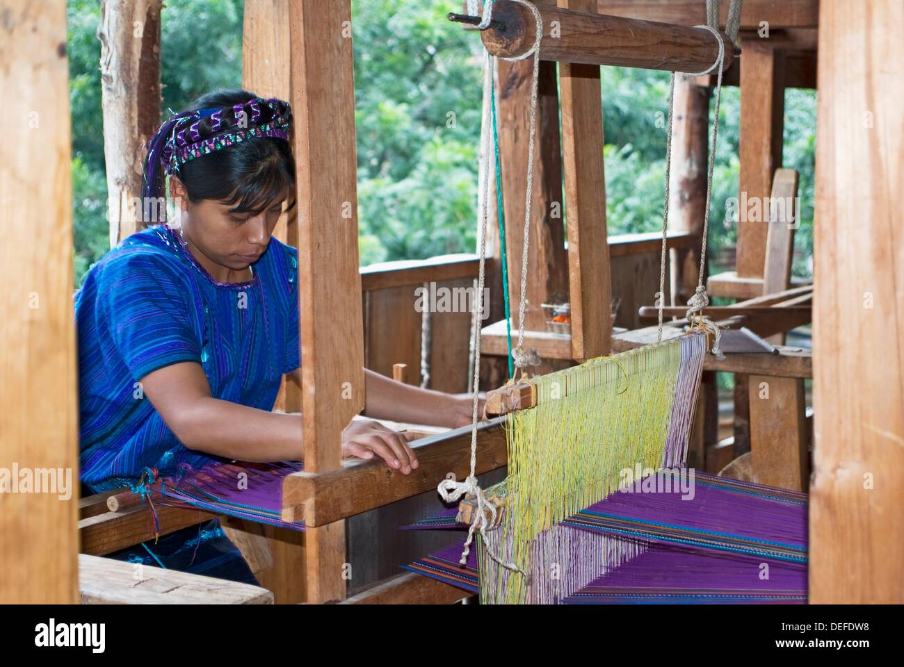 Girl in weaving on loom hi-res stock photography and images - Alamy