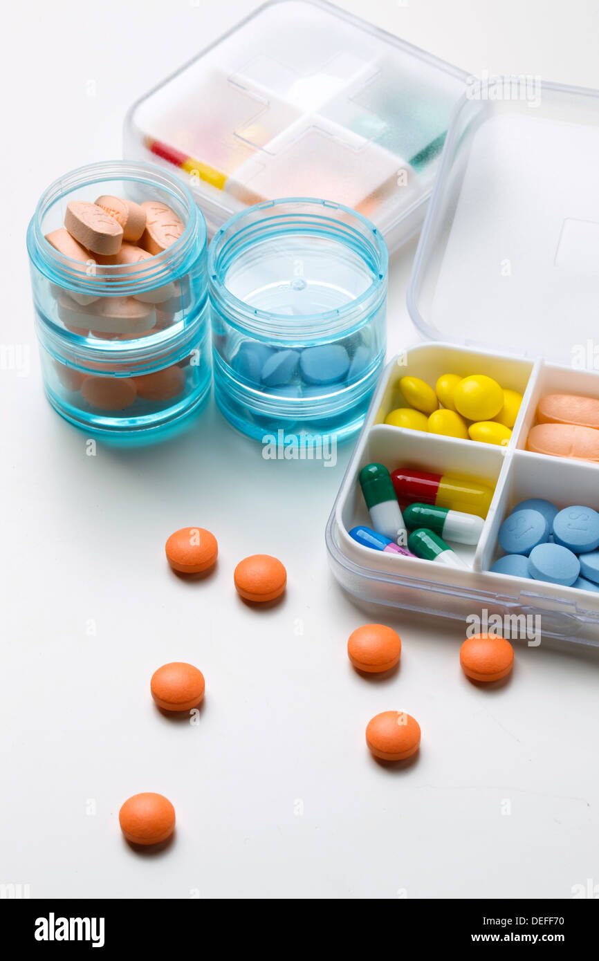 Schedule box containing capsules and capsules Stock Photo - Alamy