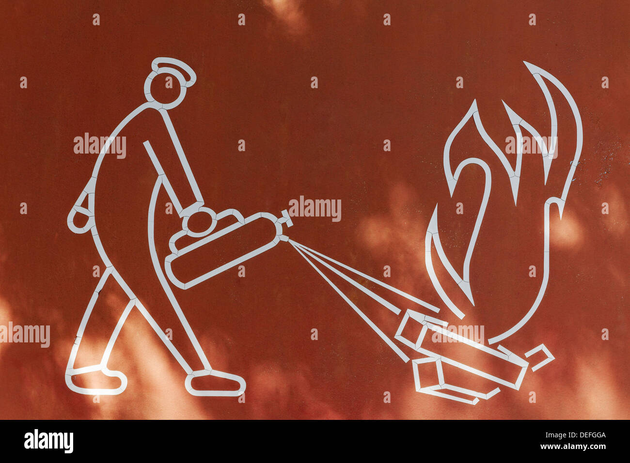 Man putting out a fire with fire extinguishers, pictogram, Innenhafen ...