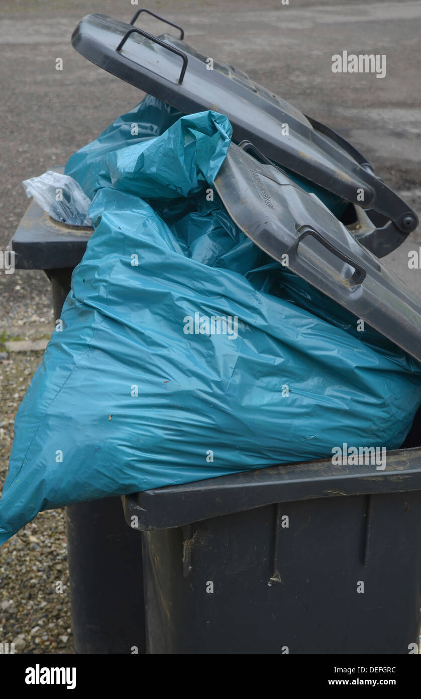 Full garbage bins hi-res stock photography and images - Alamy