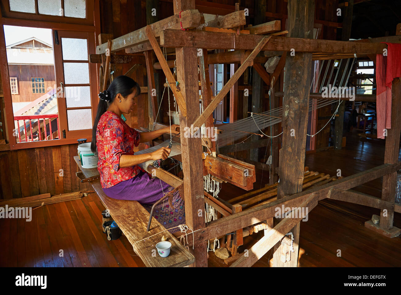 Burmese woman weaving, Nampan village, Inle Lake, Shan State, Myanmar ...