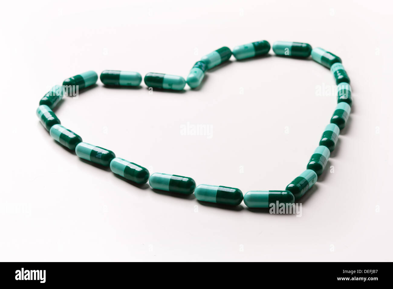 Capsules creating heart shape Stock Photo - Alamy Capsules creating heart shape Stock Photo - Alamy