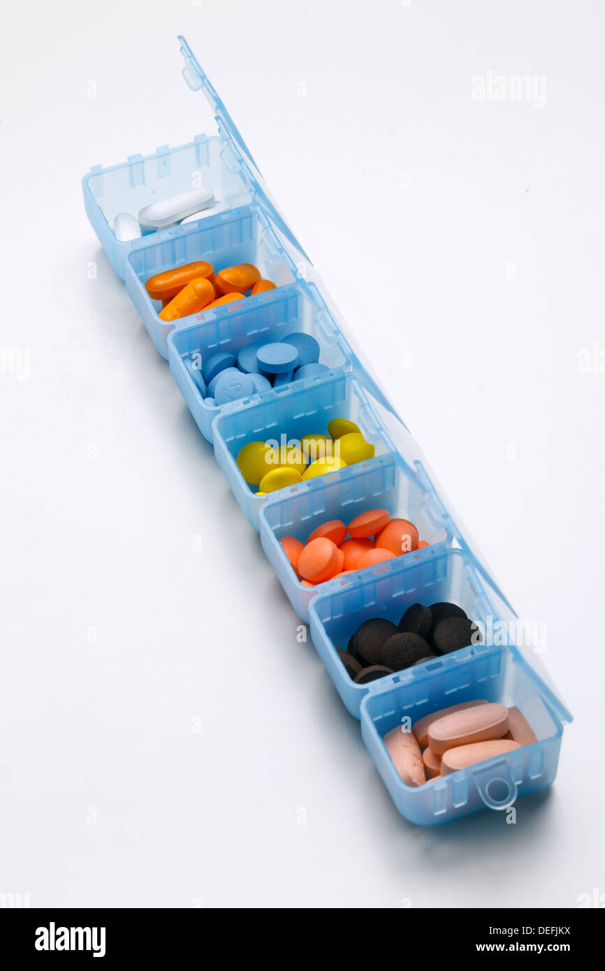 Schedule box containing capsules and capsules Stock Photo - Alamy