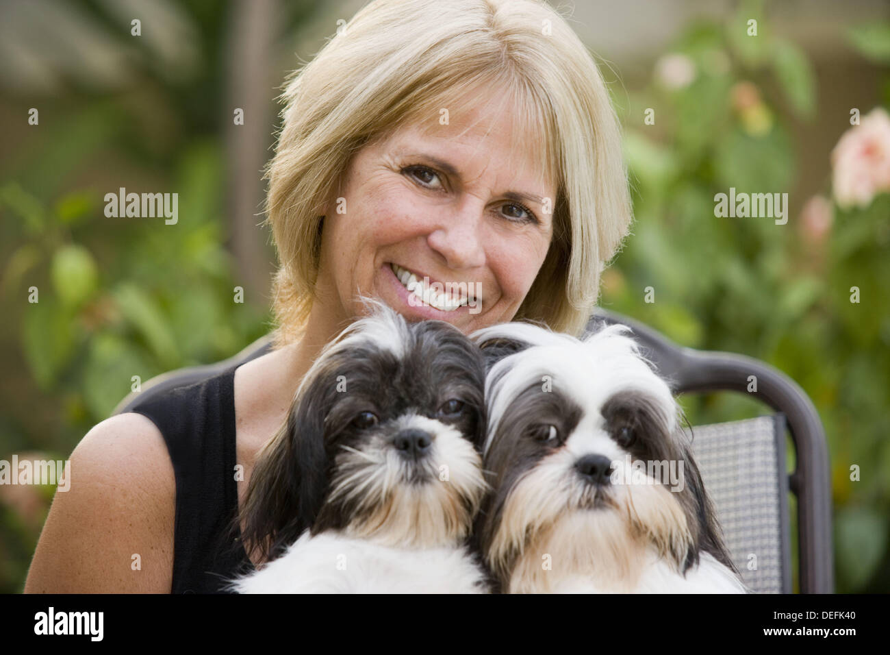 Woman and two dogs hi-res stock photography and images - Alamy
