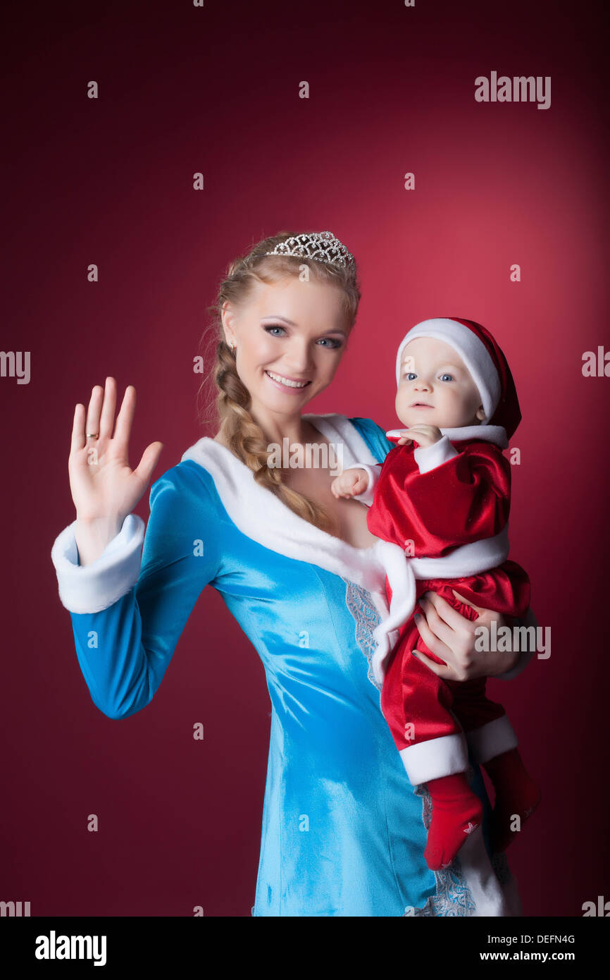 Woman santa claus costume holds hi-res stock photography and images - Alamy