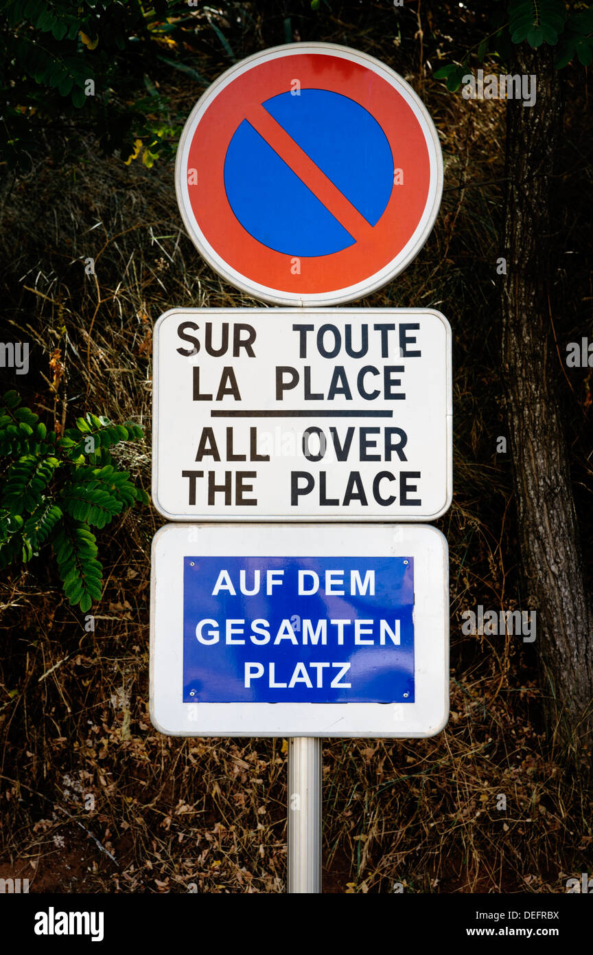 French No Parking sign with amusing translation Stock Photo - Alamy